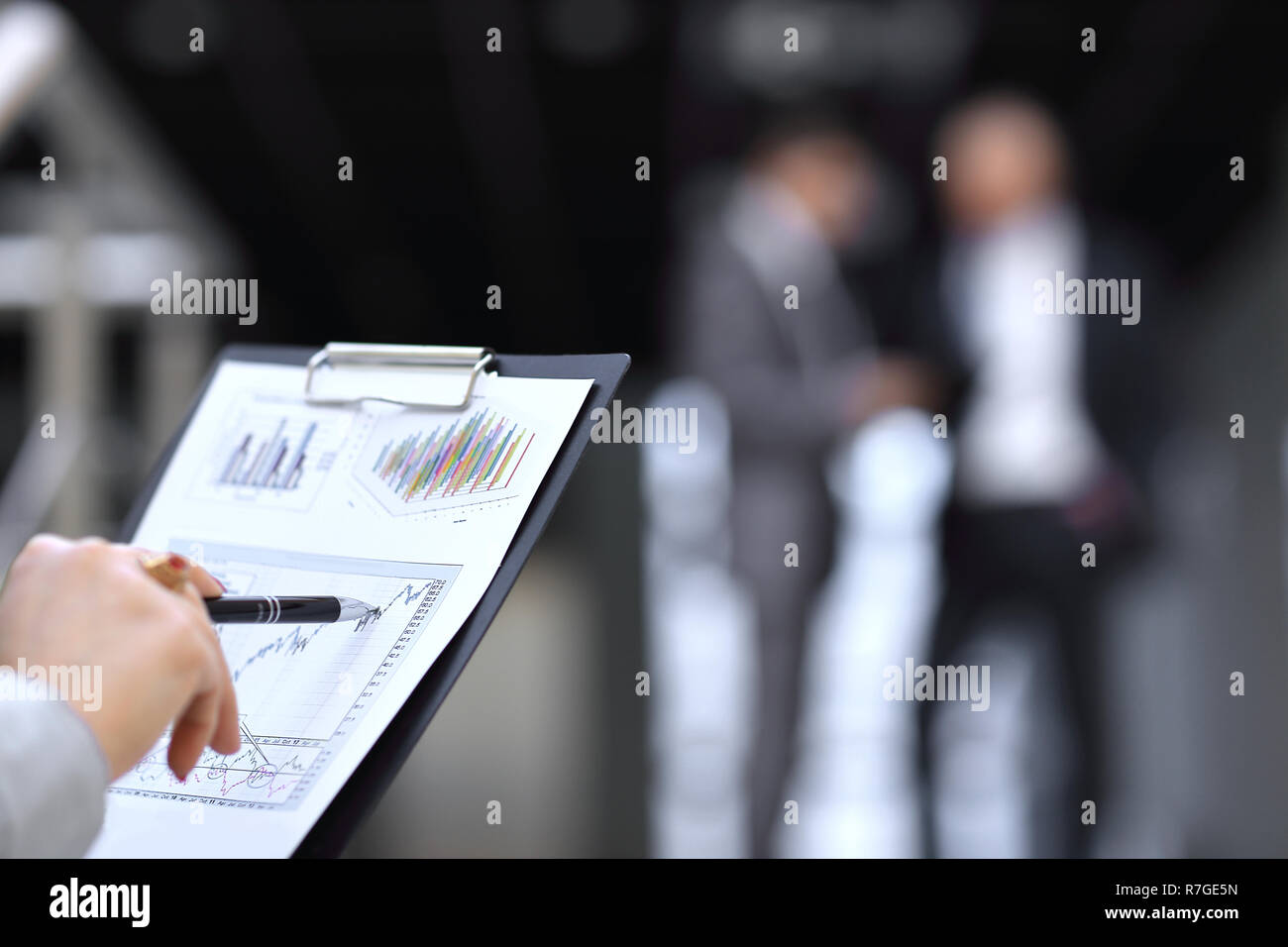 close up. financial report on blurred office background Stock Photo - Alamy