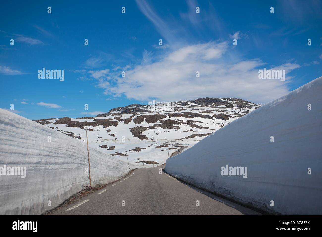snow walls around a mountain road at the Norway Stock Photo - Alamy