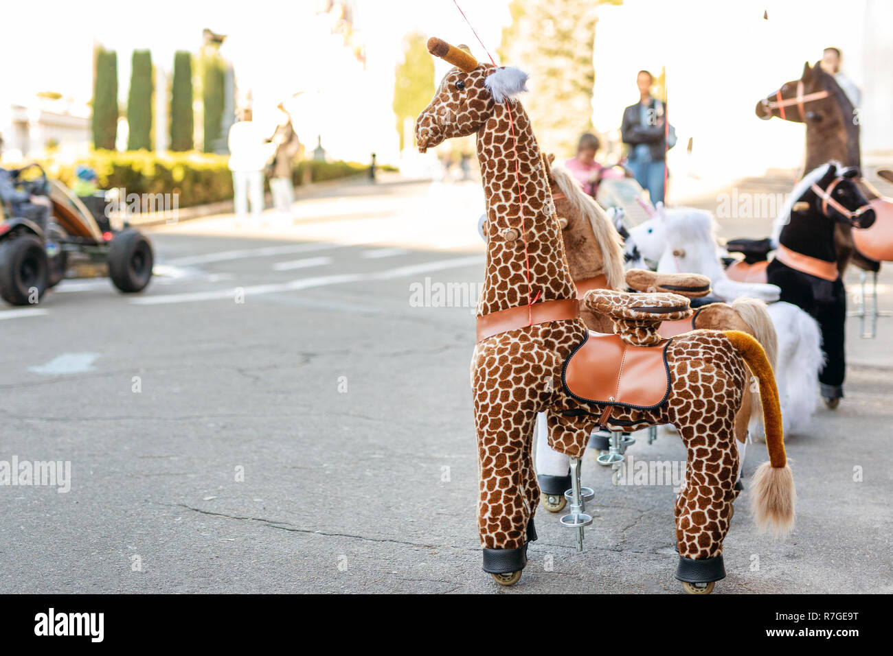 Group of large wheeled animal toys for riding. Children fun transport ...