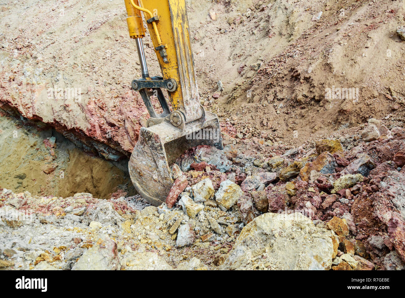 Excavator digging a trench for the pipeline. Bucket closeup Stock Photo ...