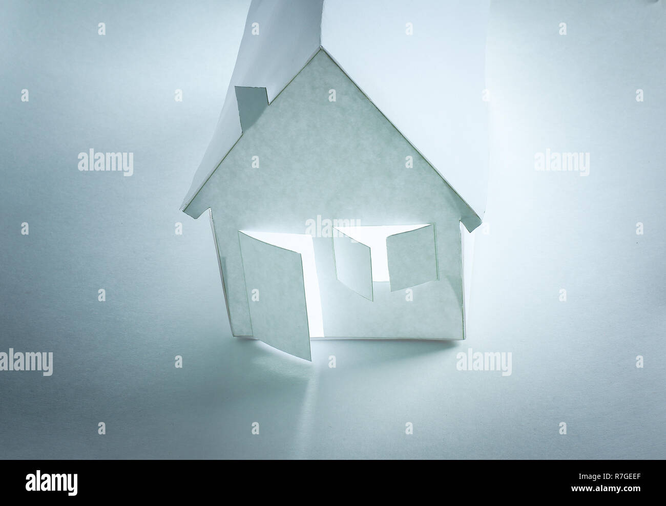 paper house paper background.the concept of a mortgage Stock Photo - Alamy