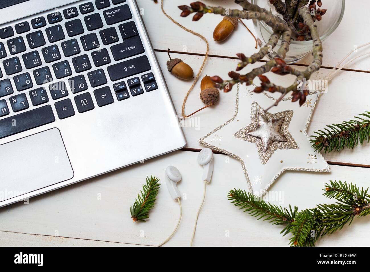 Work and holiday - laptop and Christmas decor Stock Photo - Alamy