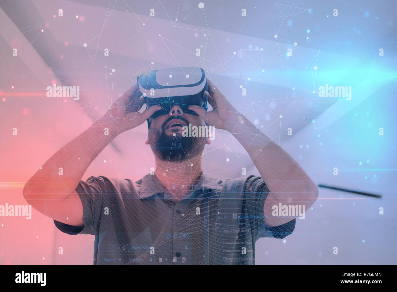 man trying virtual reality vr glasses at modern home with futuristic ...