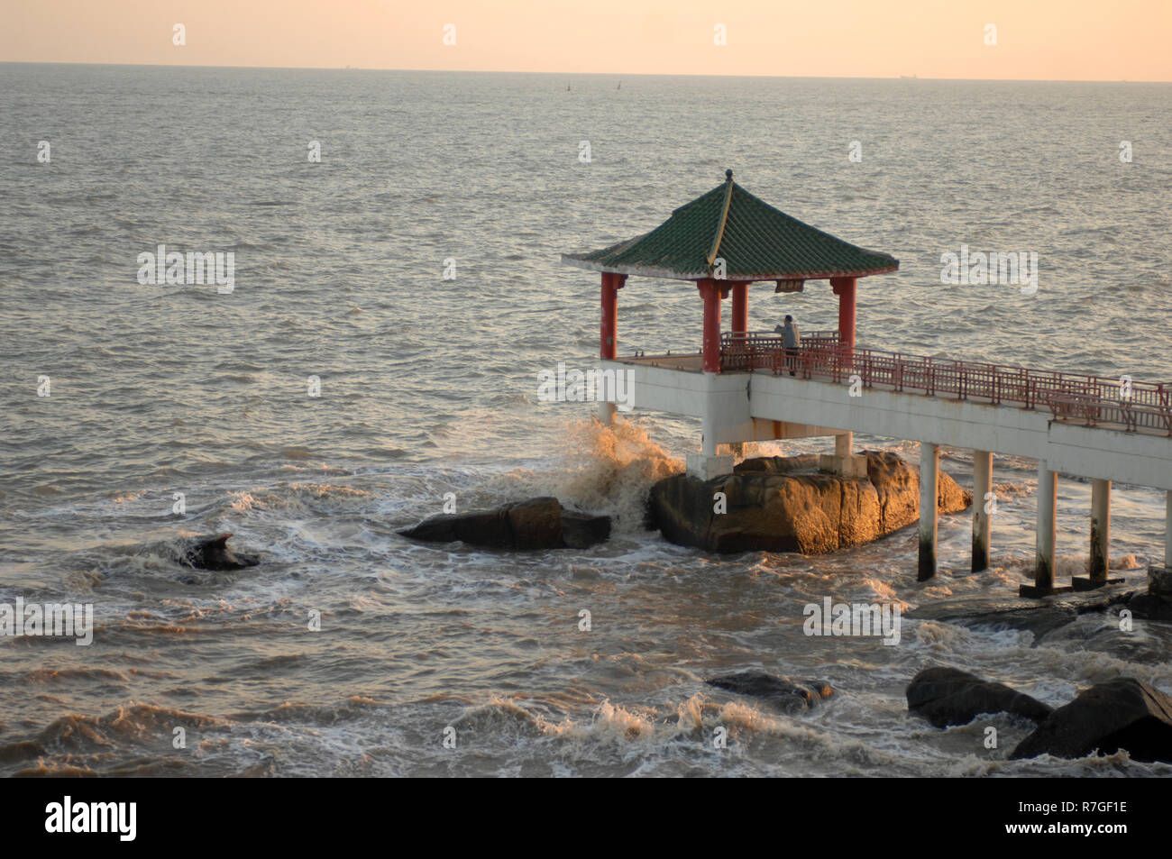 Pagado at end of pier on beach, Coloane Island, Macau, China Stock ...
