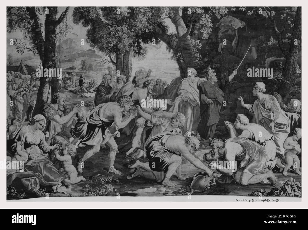 Moses striking water from Rock Stock Photo - Alamy