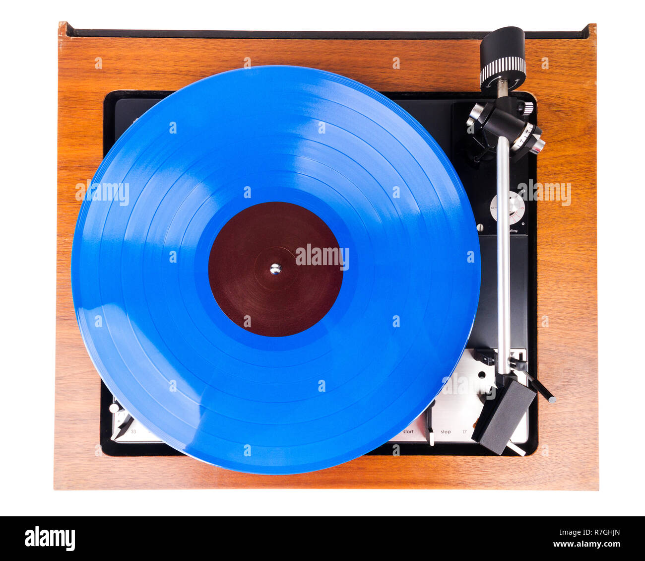 Vintage turntable with a blue vinyl isolated on white. Wooden plinth ...