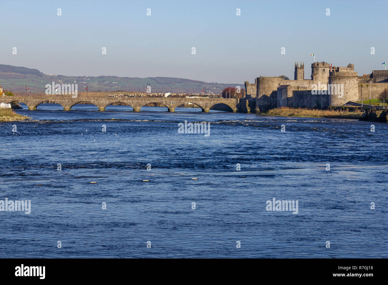 Castle, stone bridge and Shannon river, Limerick, Ireland Stock Photo ...