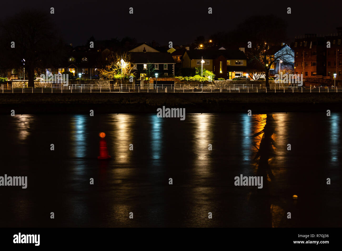 City lights with tree shadow at Shannon river, Limerick, Ireland Stock ...