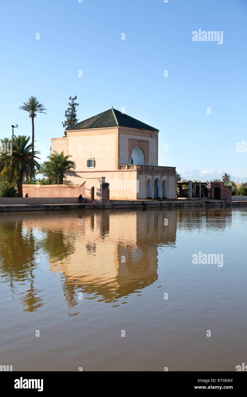 The Menara Gardens Marrakech Morocco, with pavilion and Atlas Mountains ...