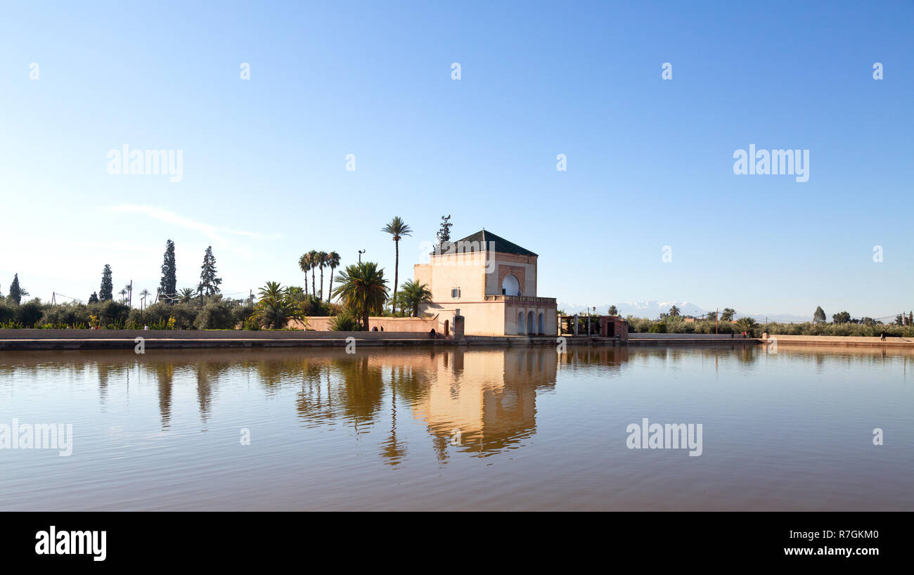 The Menara Gardens Marrakech Morocco, with pavilion and Atlas Mountains ...