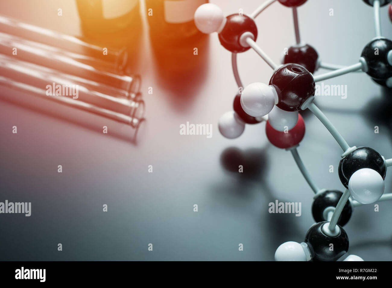 molecular formula and laboratory equipment on blue background. Science ...