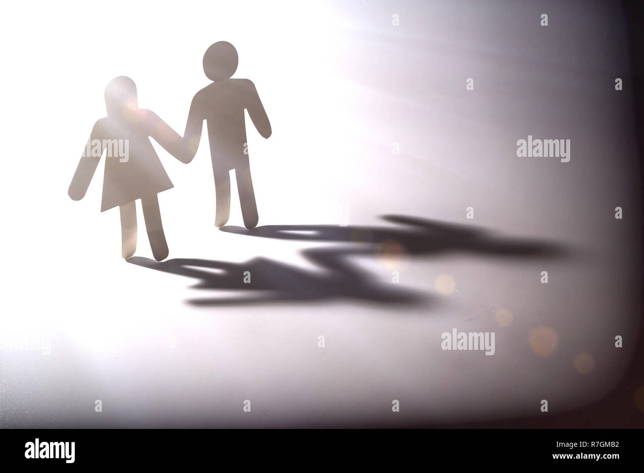 Couple go into the light, conceptual image Stock Photo - Alamy