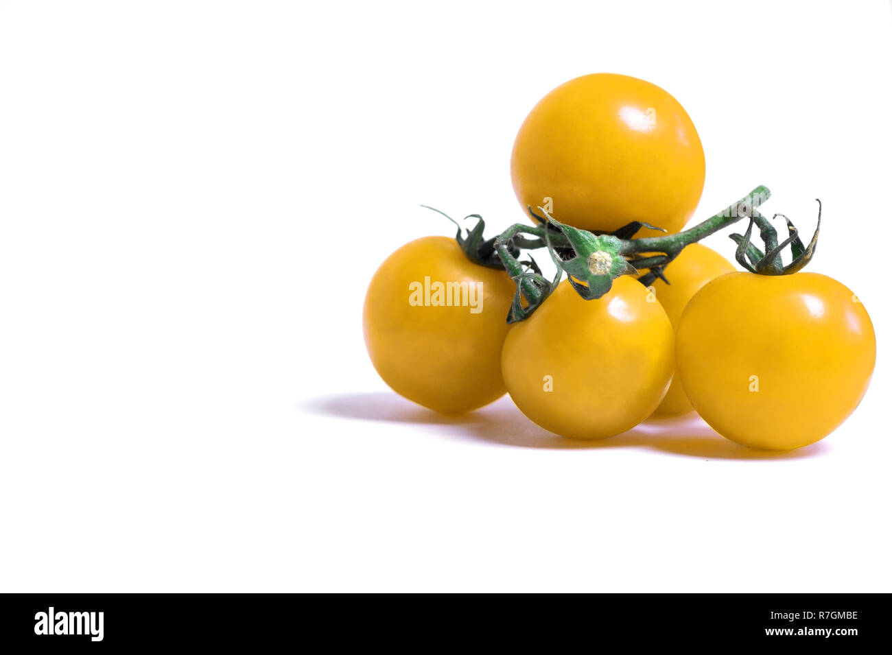 Close-up of yellow cherry tomatoes isolated on white Background Stock ...