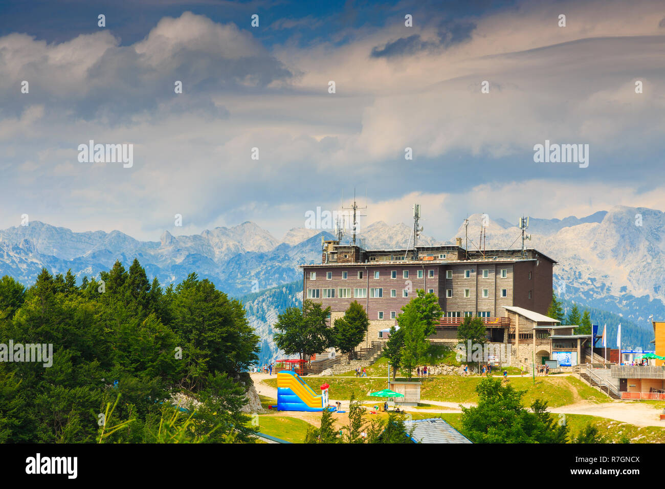 Mountain range and building Stock Photo - Alamy