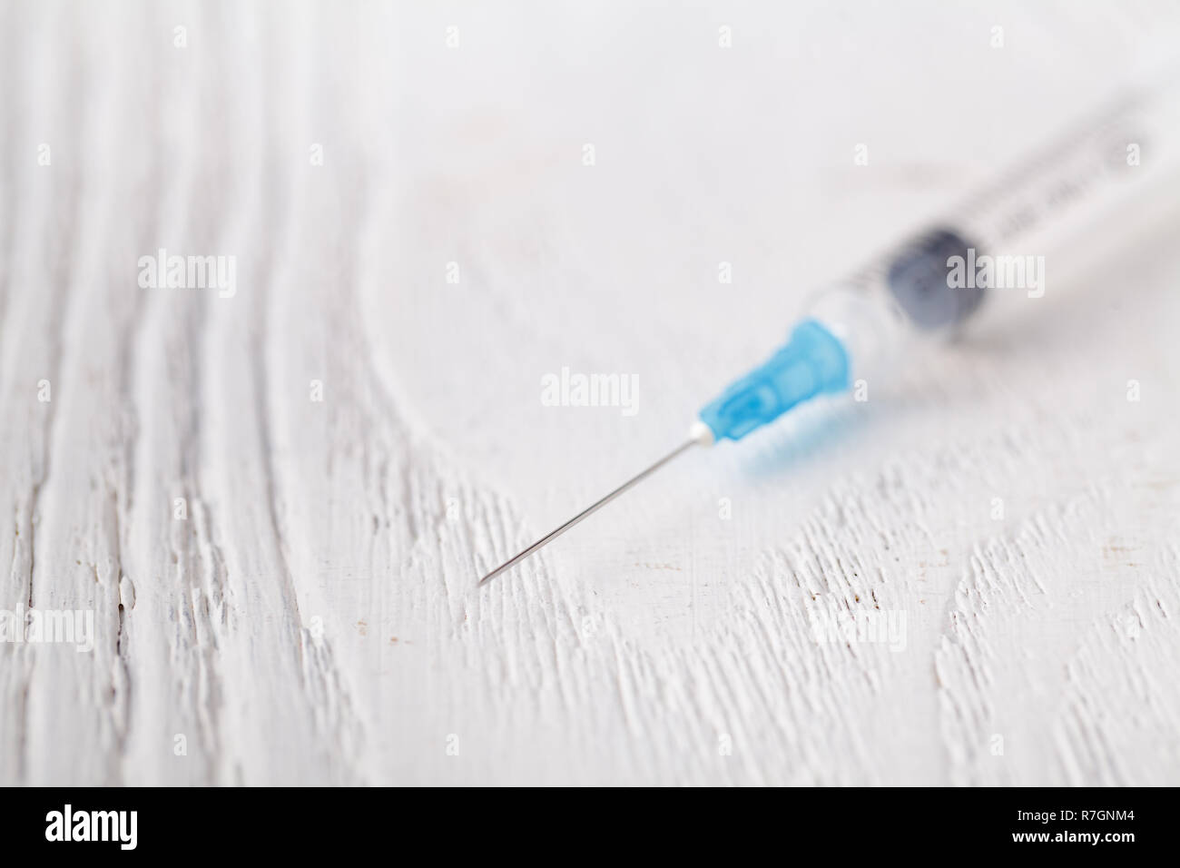 Medical Syringe needle injector on white Stock Photo - Alamy