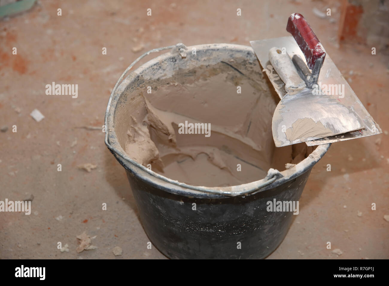Filling walls and ceilings with plaster and gypsum plaster Stock Photo ...