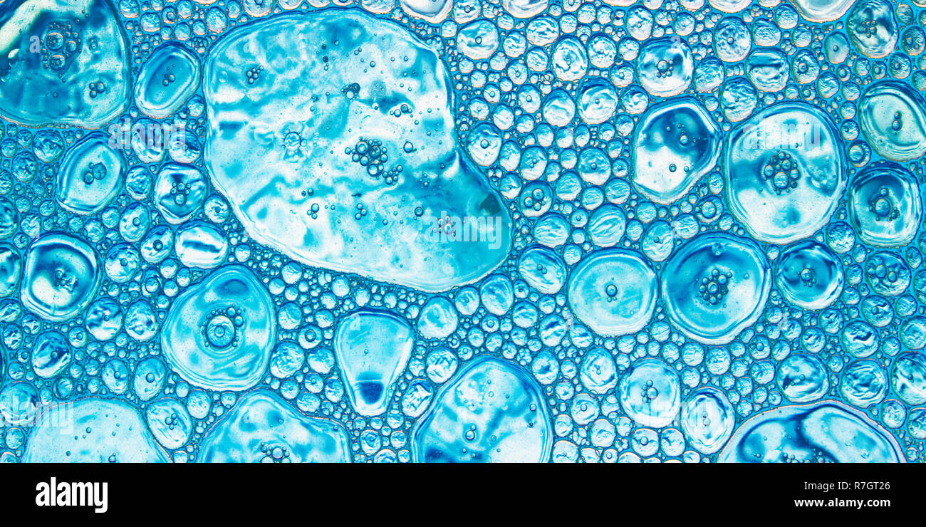 Colored abstract background in azure tones, oil drops of different ...