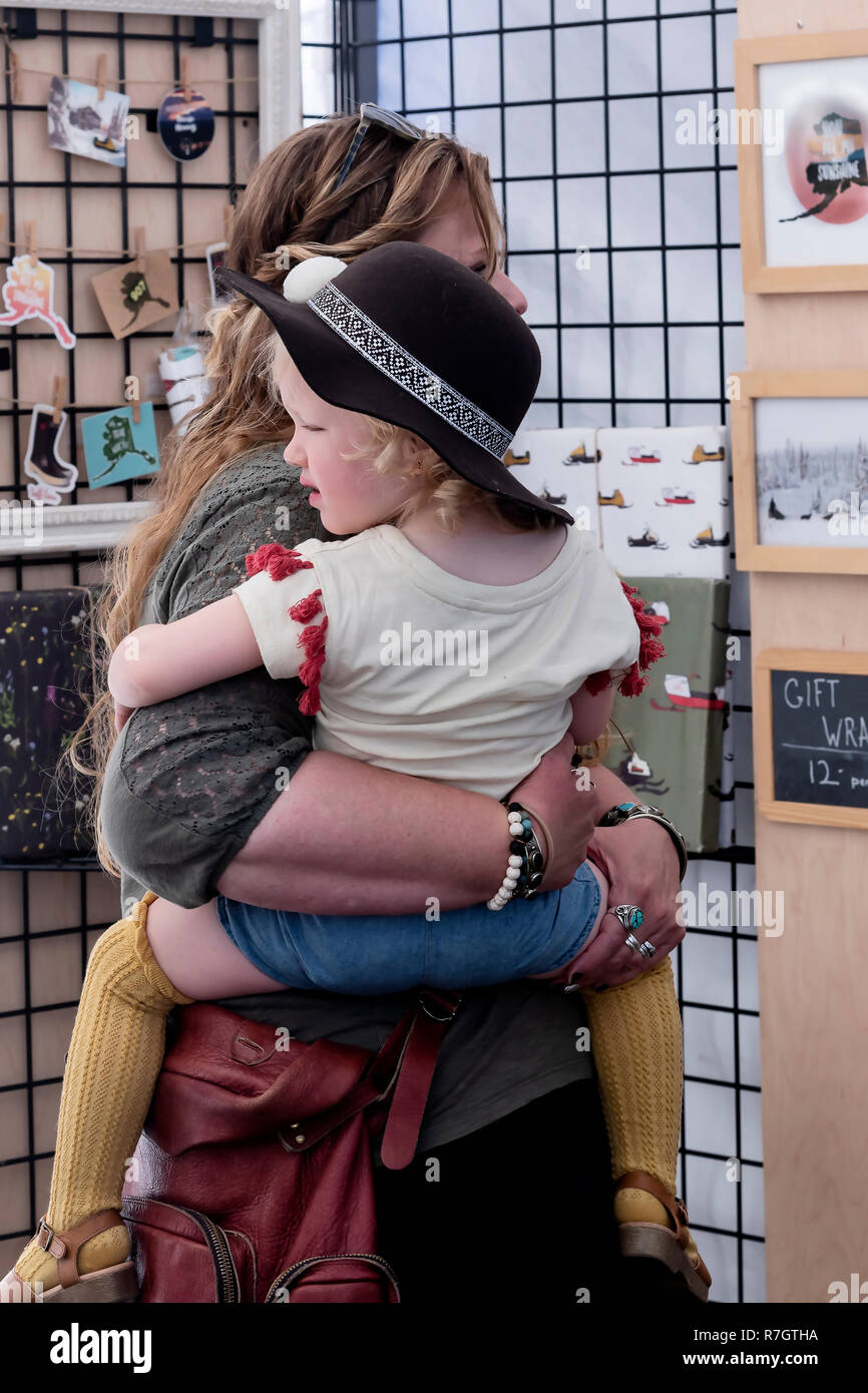 Mom with a child at the fair, Anchorage, Alaska, USA Stock Photo - Alamy