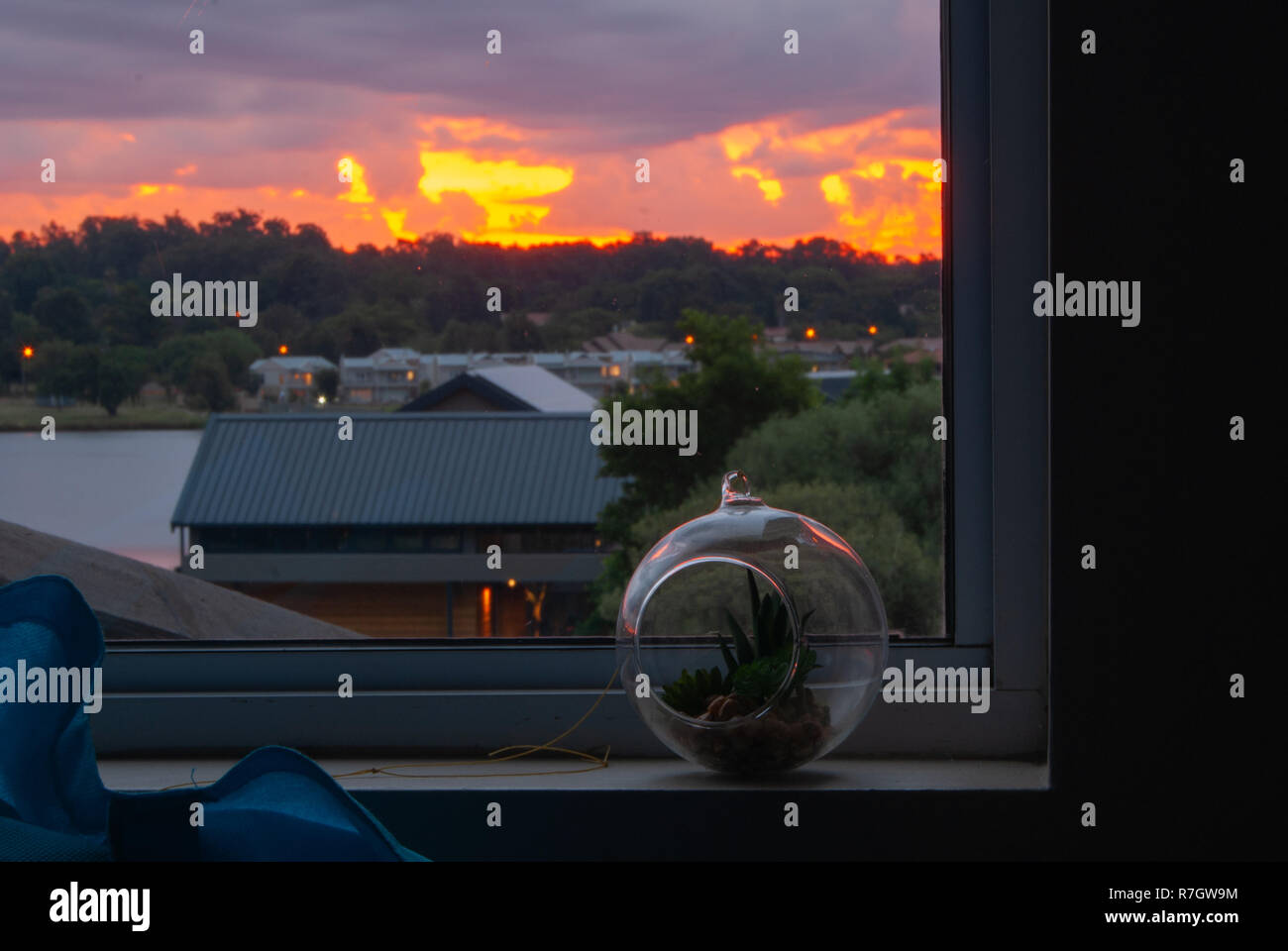 Sunset through a window Stock Photo - Alamy
