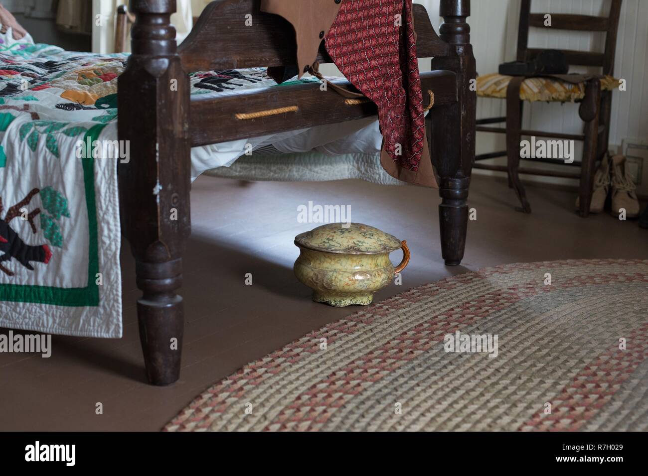 A chamber pot under a bed, part of a display at the Yaquina Bay ...