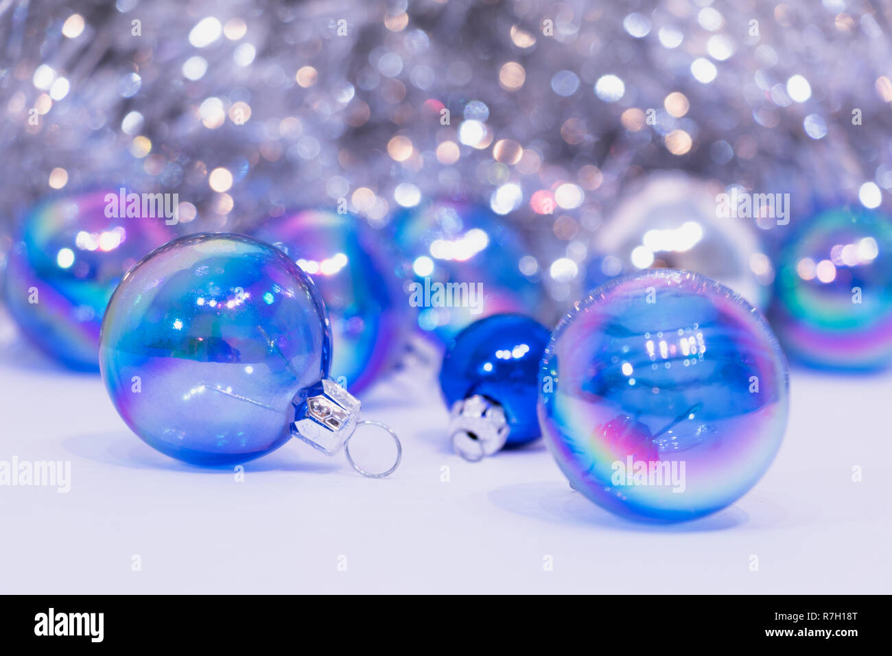Christmas scene with Blue XMAS Balls, lights in background Stock Photo ...