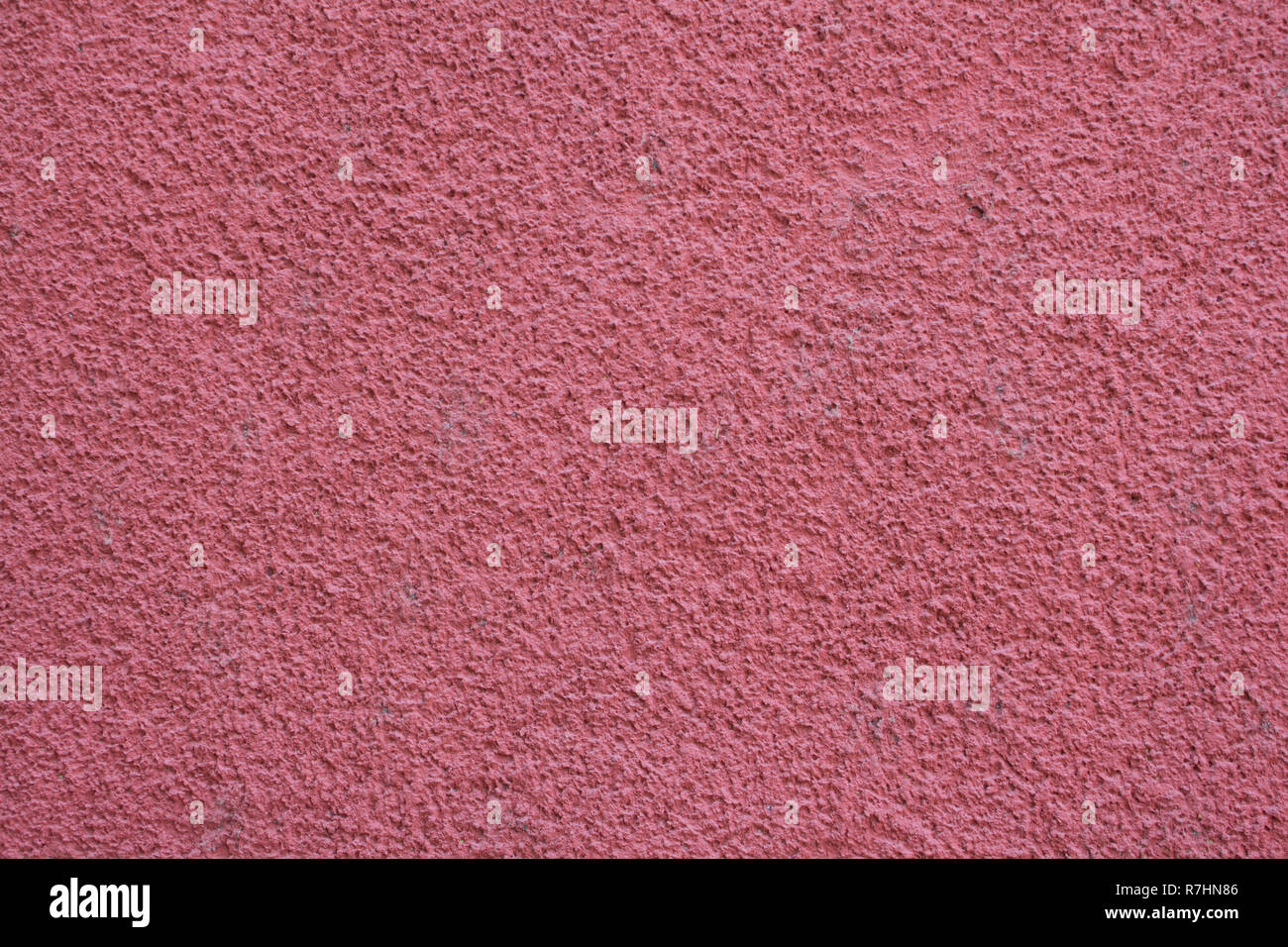 Reddish wall concrete texture background Stock Photo - Alamy