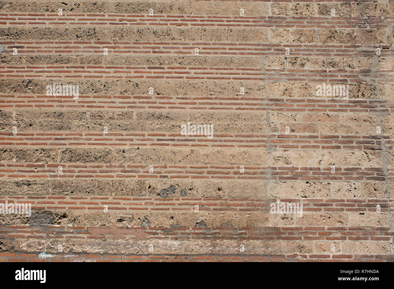 Strange wall bricks reddish horizontal texture Stock Photo - Alamy