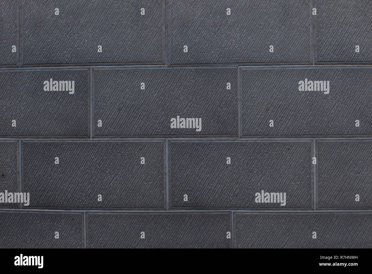 Texture of grey bricks hi-res stock photography and images - Alamy