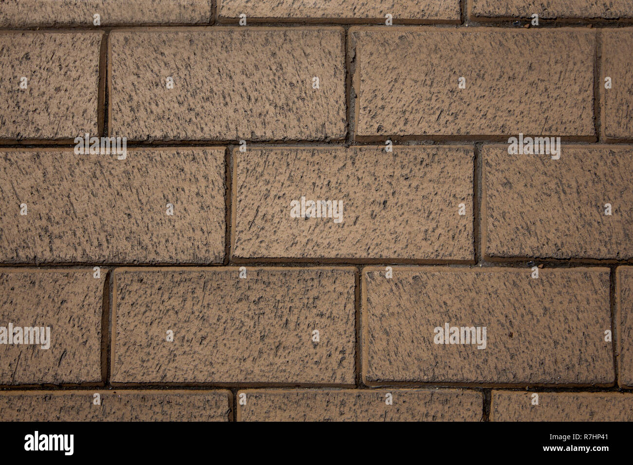 Beige grey wall bricks Stock Photo - Alamy