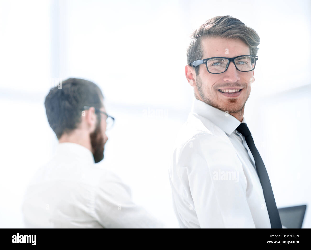 rear view.employees in the workplace Stock Photo - Alamy