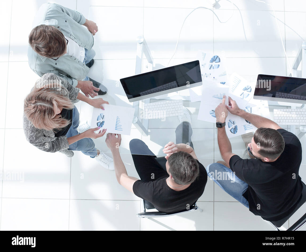 Image from above of business people sitting around conference de Stock ...