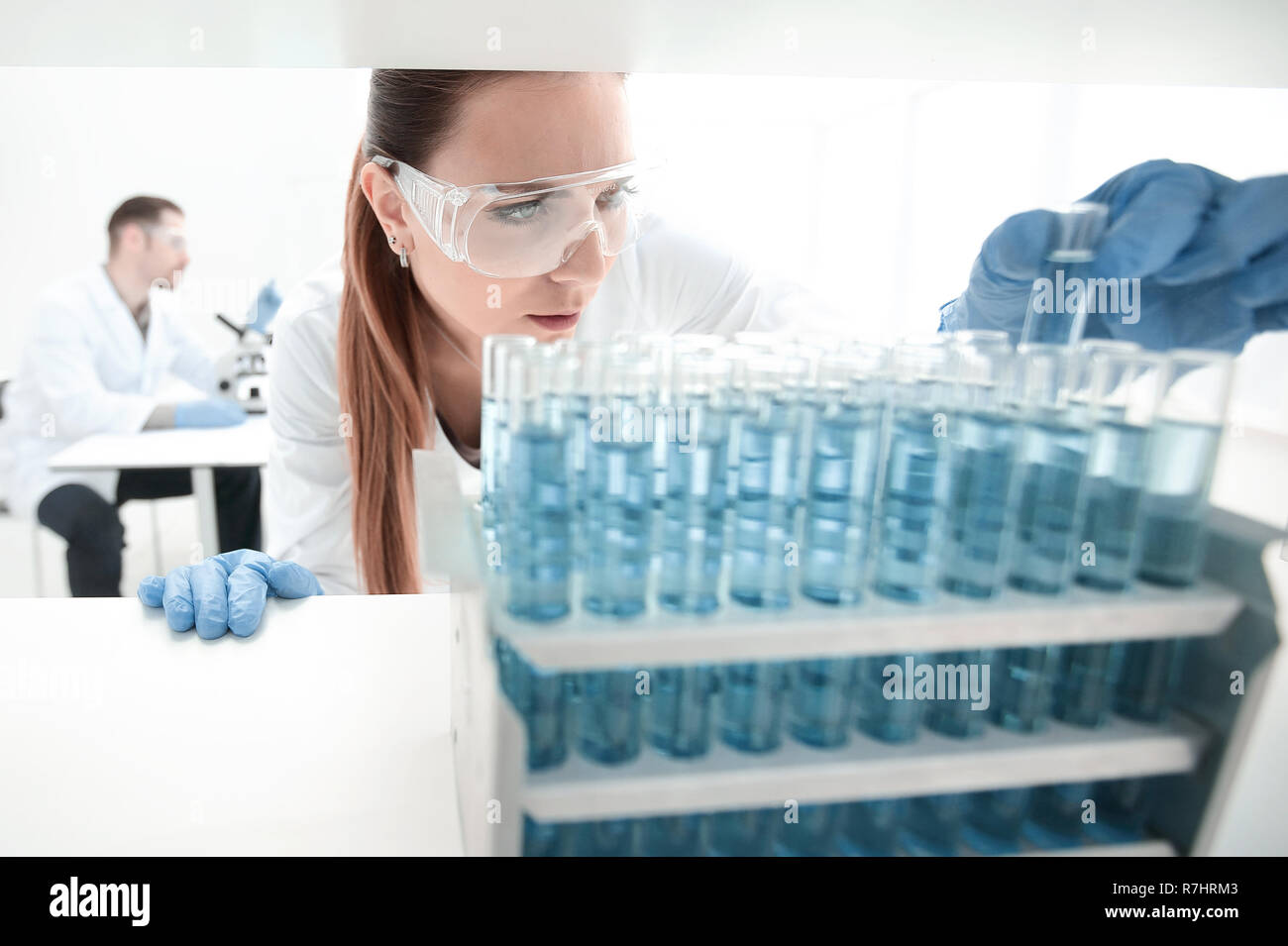 close up.scientist making tests of the liquid Stock Photo - Alamy