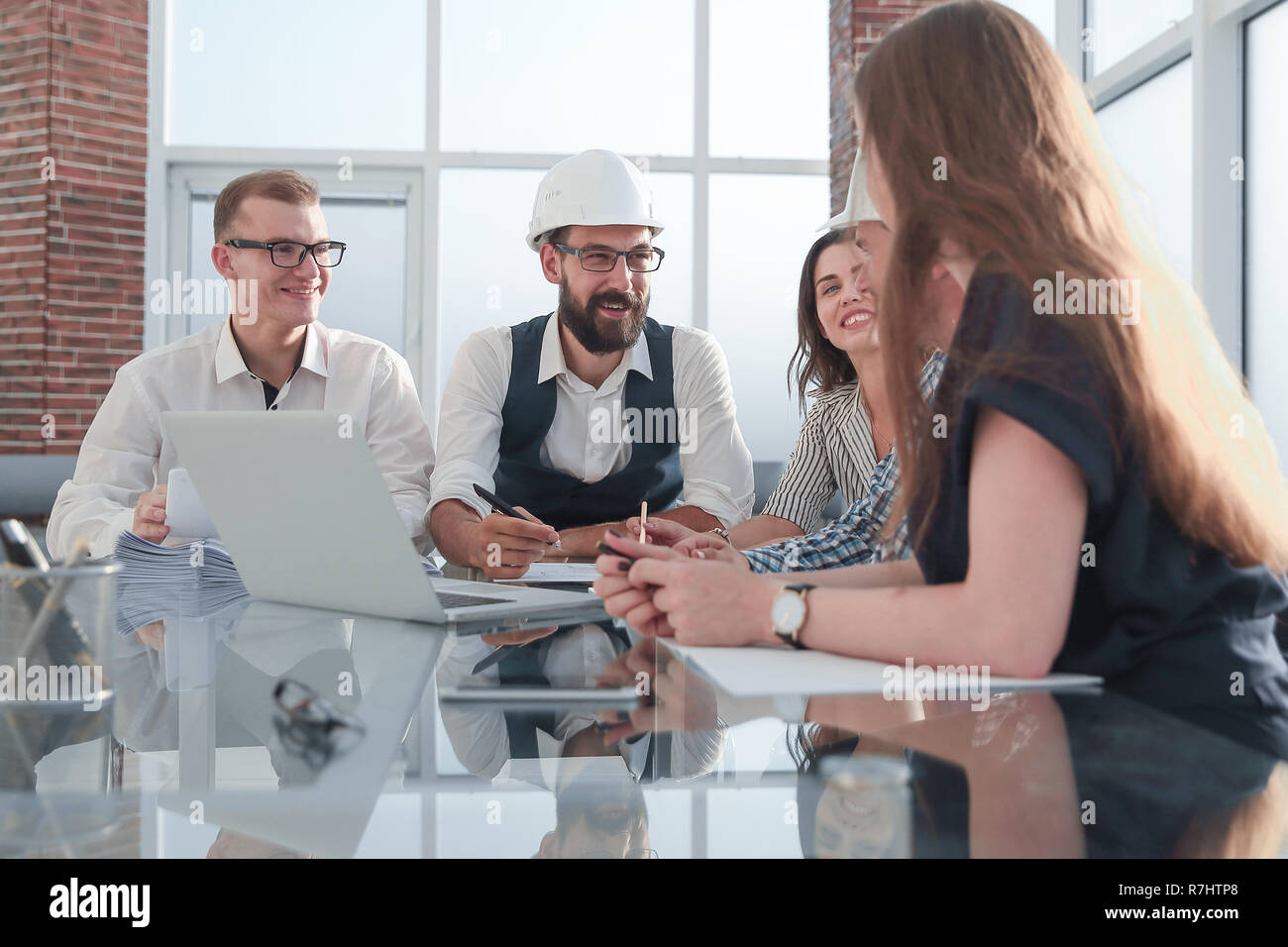 Architect client discussing plan blueprint hi-res stock photography and ...