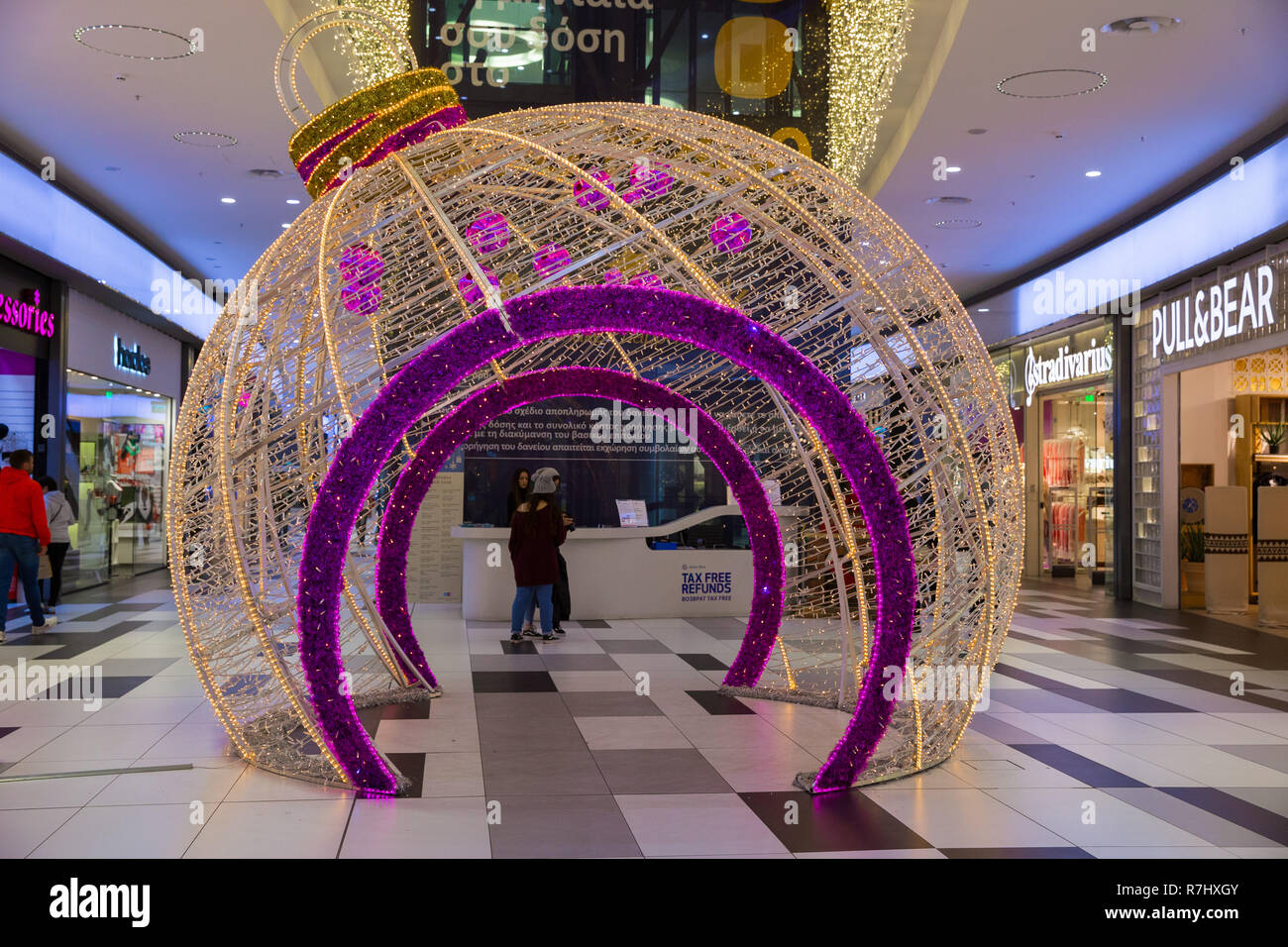 City Paphos, Cyprus. Christmas decor in supermarkrt. Peoples and store ...