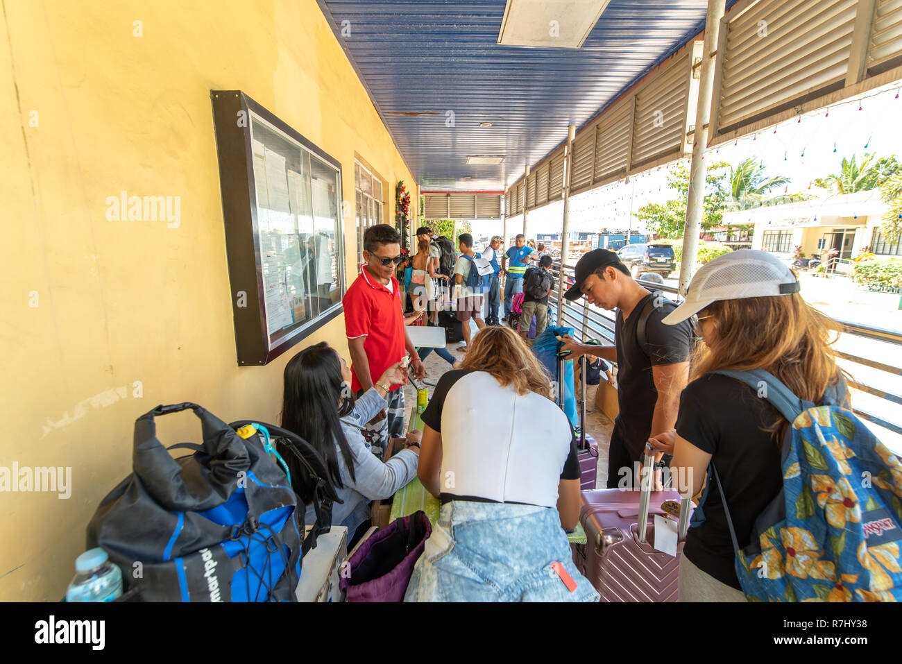 Nov 17, 2018 People entering the passenger terminal from the Coron port ...