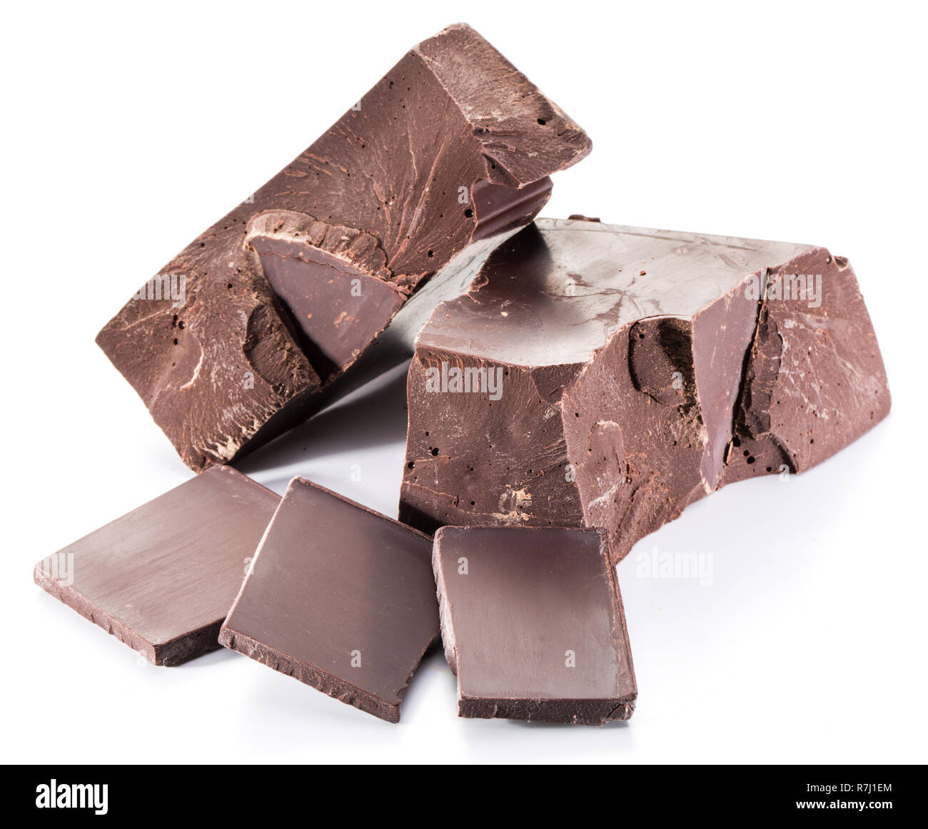 Chocolate blocks and pieces of chocolate bar isolated on a white ...