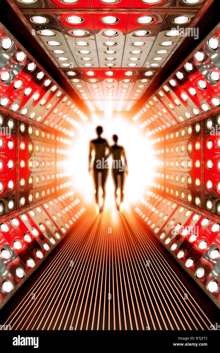 Fantastic tunnel from which is visible silhouette of aliens Stock Photo ...