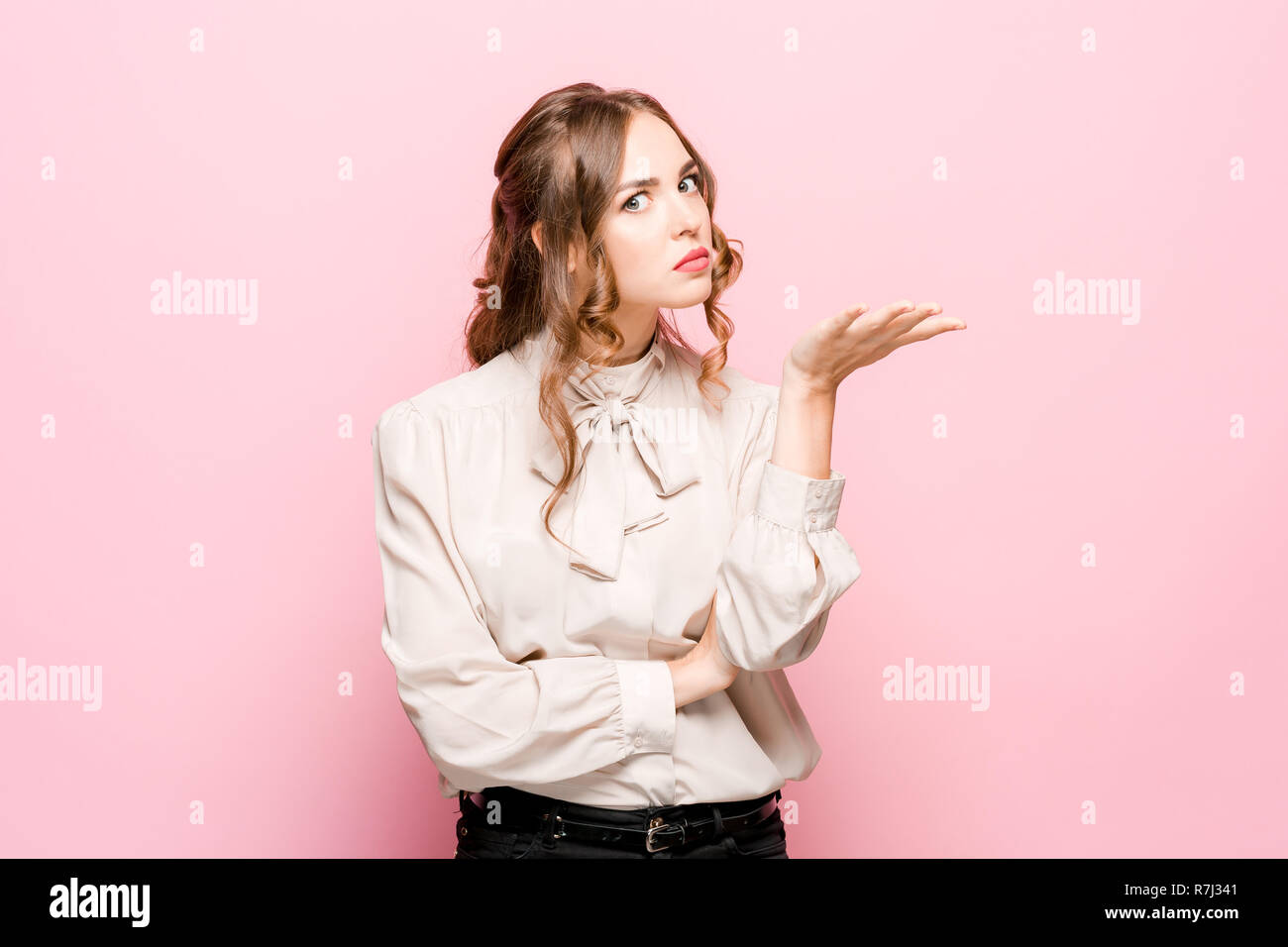 Serious unhappy female has appealing appearance, being sad after ...