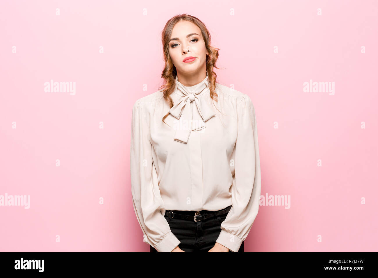 Serious unhappy female has appealing appearance, being sad after ...