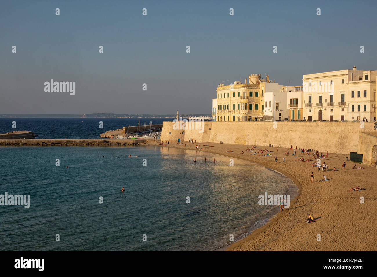 Gallipoli, old city, with traditional houses beside sea wall ...