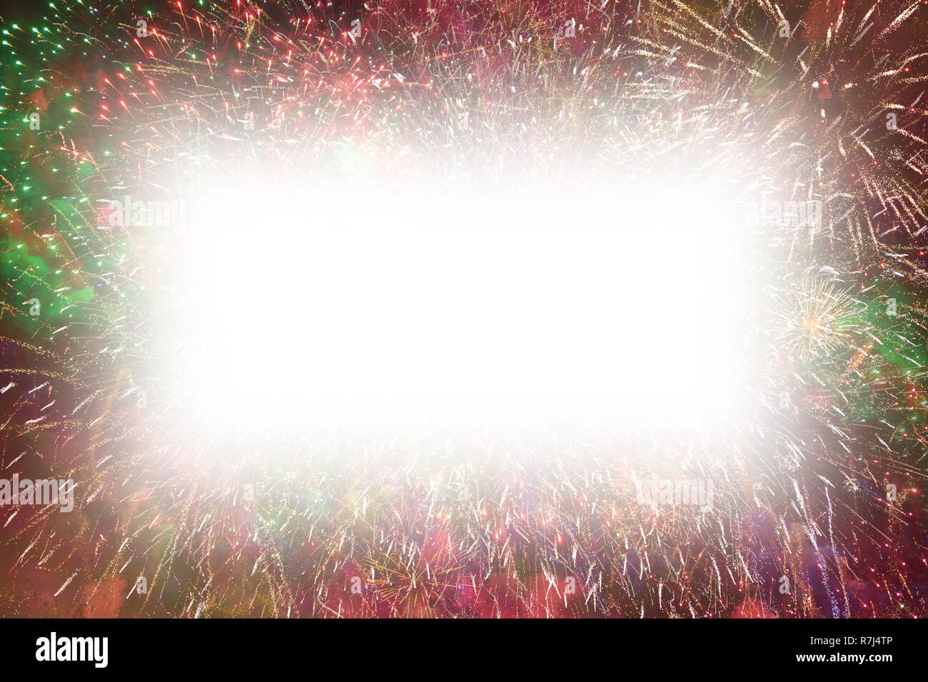 Colorful fireworks with white rectangle glowing edges copy space in the ...