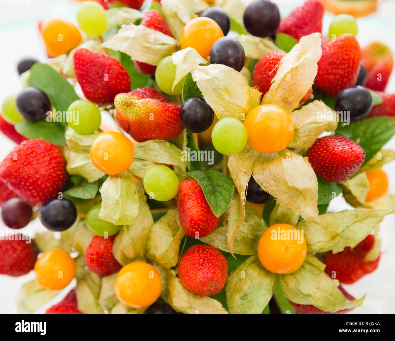 Snacks of fruit and berries. Creative dish Stock Photo - Alamy