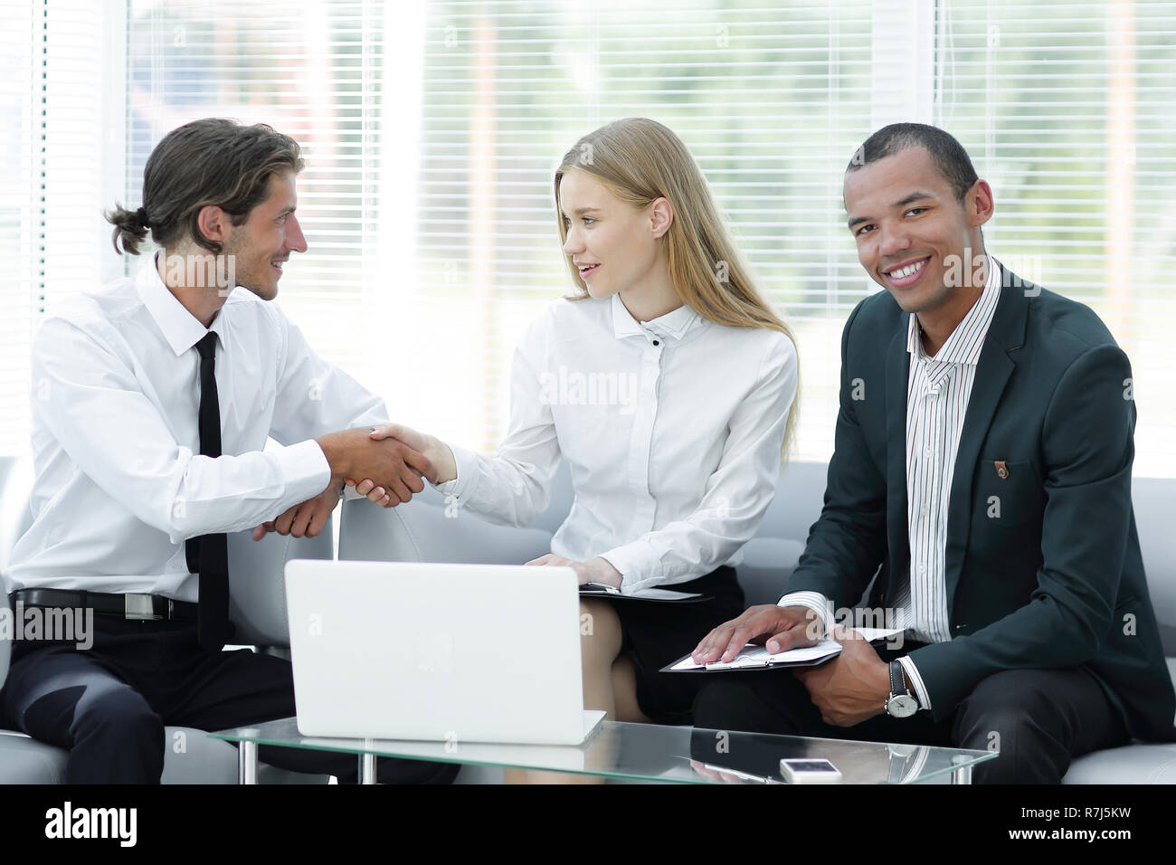 welcome handshake Manager and the client.photo with copy space Stock ...
