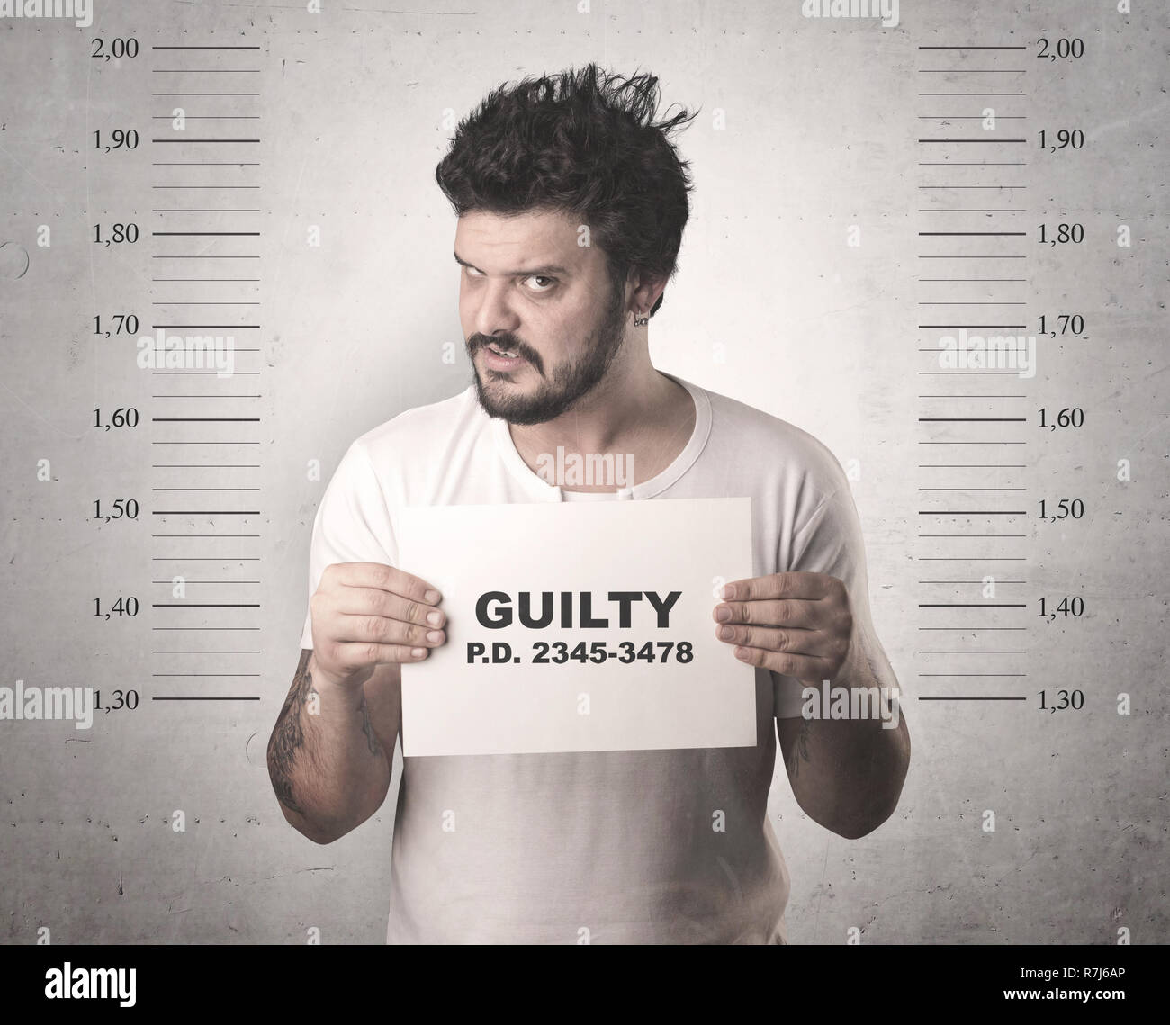 Caught guilty man with ID signs on his hand Stock Photo - Alamy