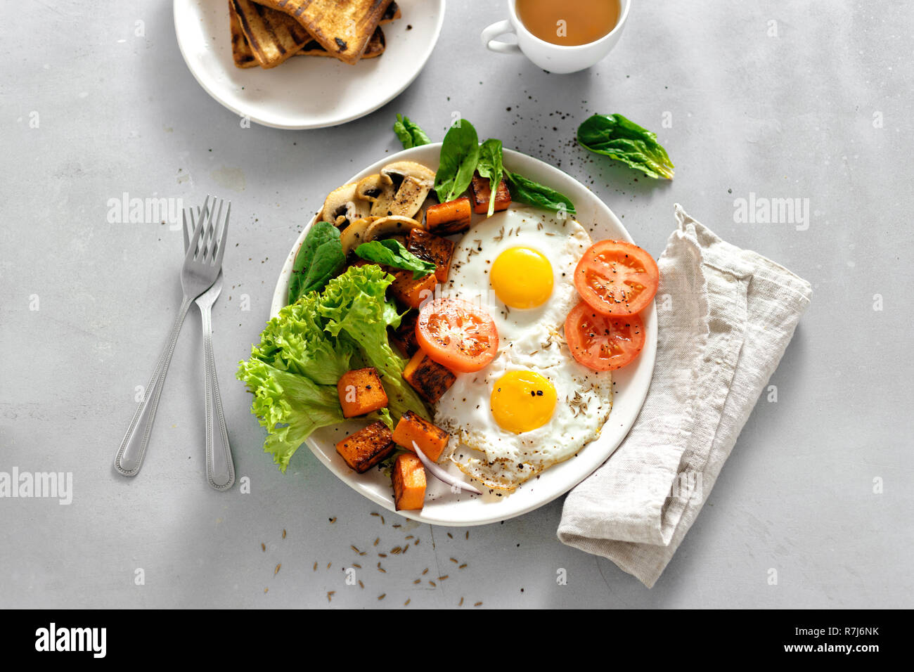 Breakfast table Breakfast plate fried eggs vegetables mushrooms toast ...