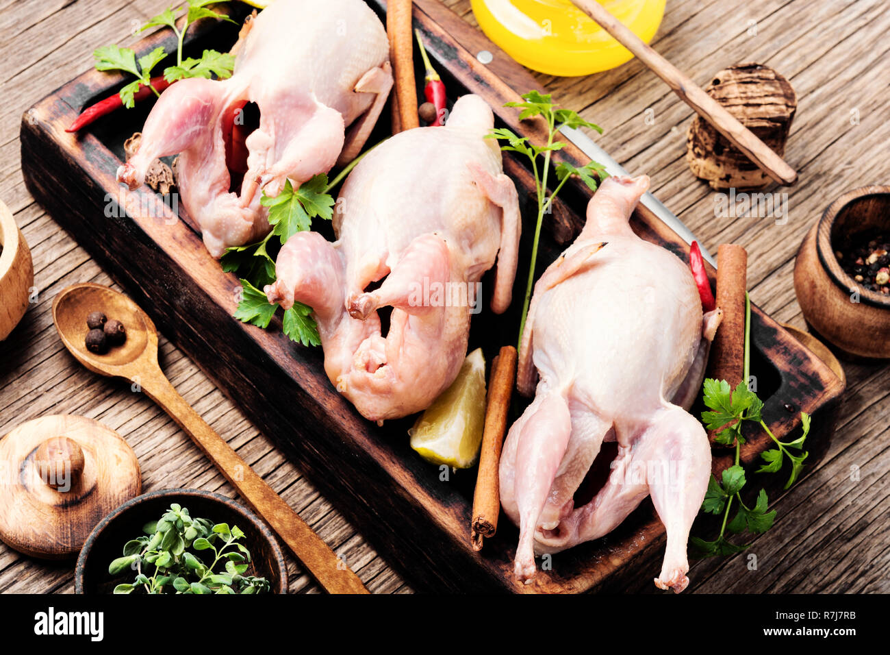 Fresh raw meat quails ready for cooking.Raw quail Stock Photo - Alamy