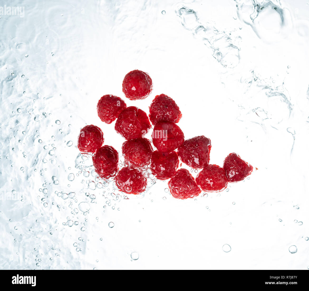 Raspberries water splashing hi-res stock photography and images - Alamy