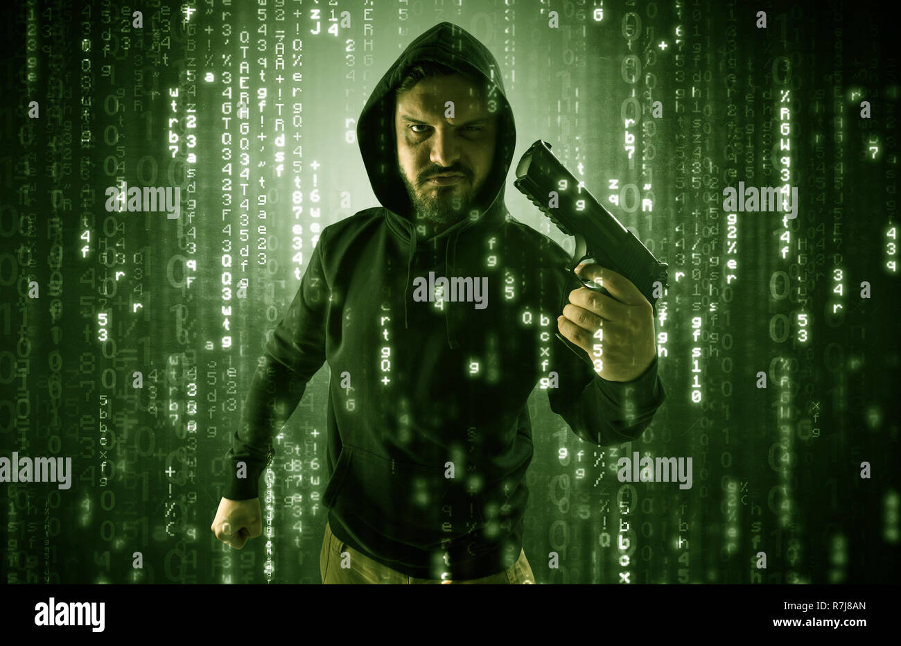 Masked and armed anonymous hacker breaking in cyber security cloud data ...