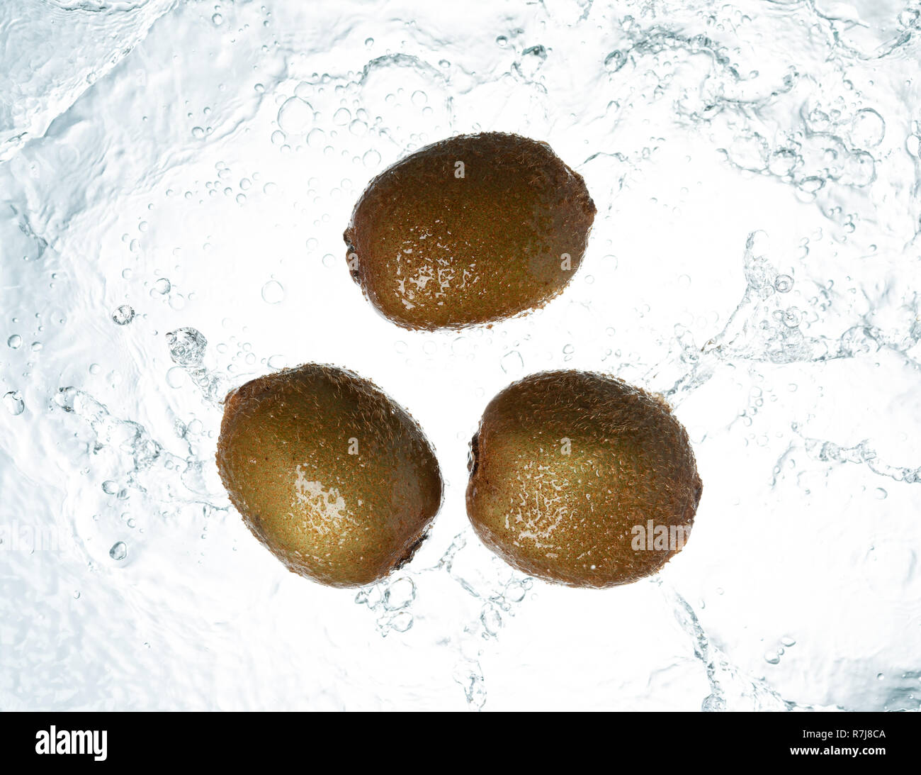 Kiwi Water Splash on White Background Stock Photo - Alamy