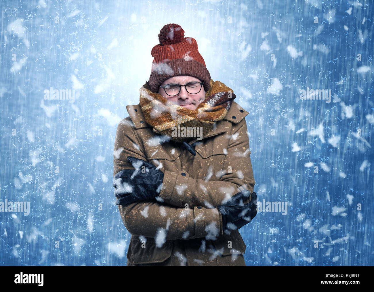 Coat gloves shivering cold hi-res stock photography and images - Alamy